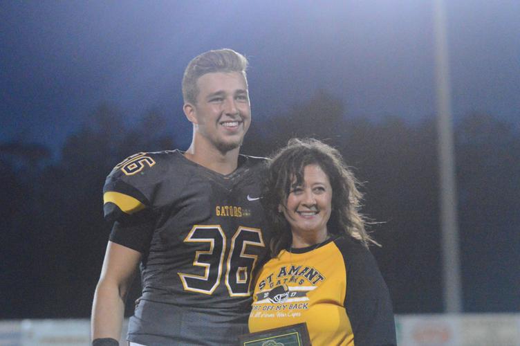 St. Amant High football players present awards to faculty, staff for ...