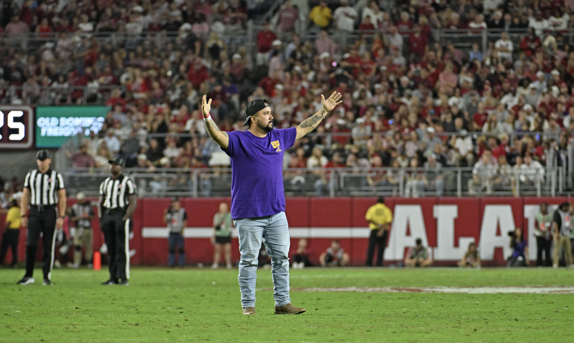 LSU fan went on the field at Alabama game on a dare | Crime/Police ...