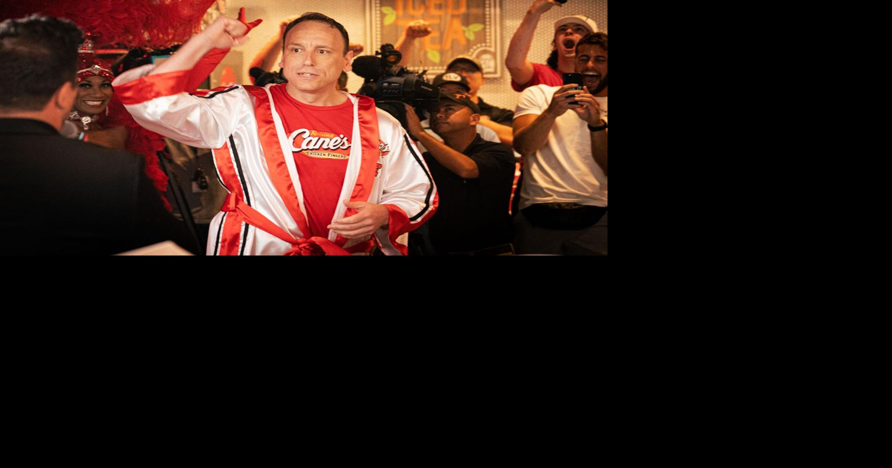 Joey Chestnut set a new record for eating Cane's chicken fingers. See ...