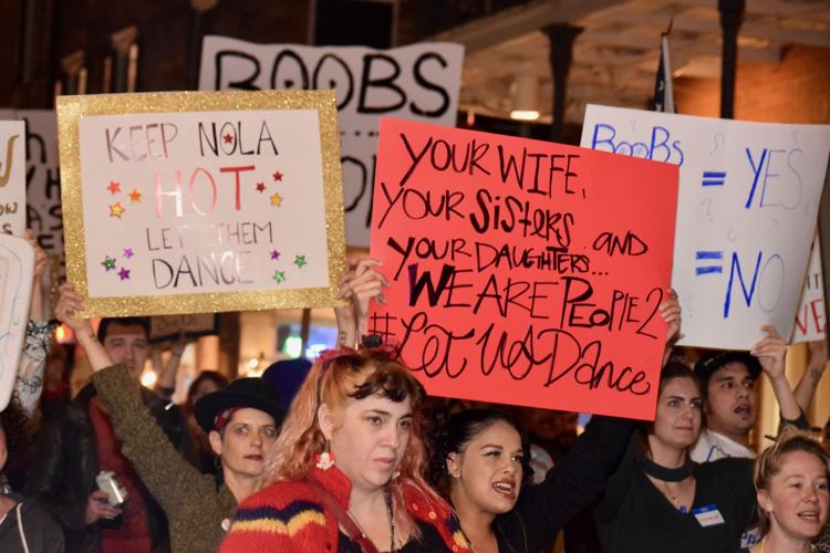 'Let us dance': Protesting strip club workers take over Bourbon Street ...