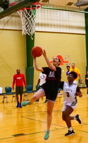 Copper Mill Elementary students and teachers face off in basketball ...