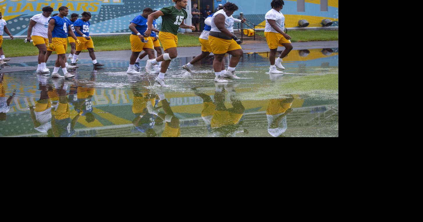 Southern football starts camp with two players missing on a soggy ...