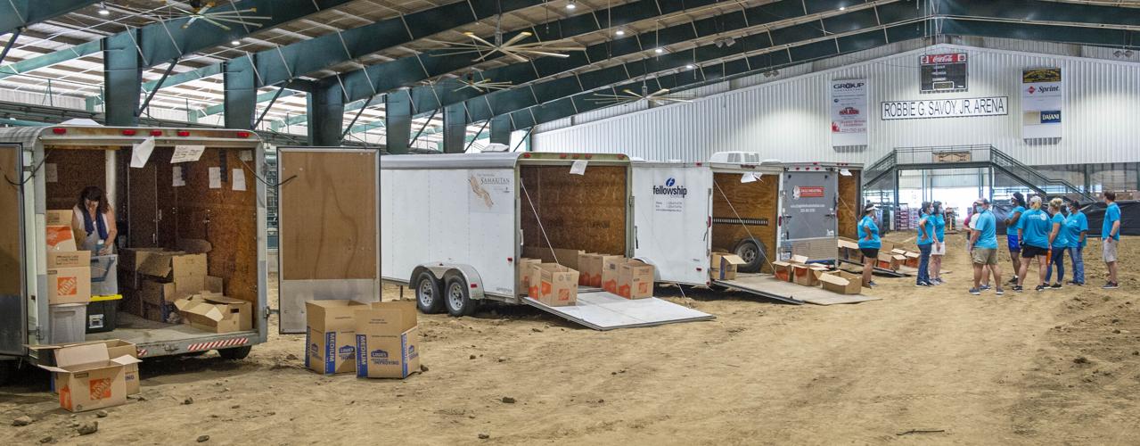Ascension residents drive thru rodeo arena to donate to Hurricane Laura ...