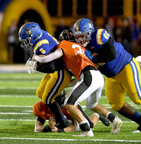 Old school on a new field: Defense sets tone as St. Amant edges East ...