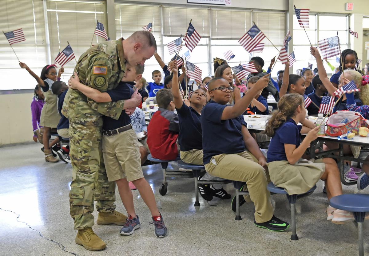 Photos, video: Emotional moment as military father returns home ...