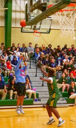 Copper Mill Elementary students and teachers face off in basketball ...