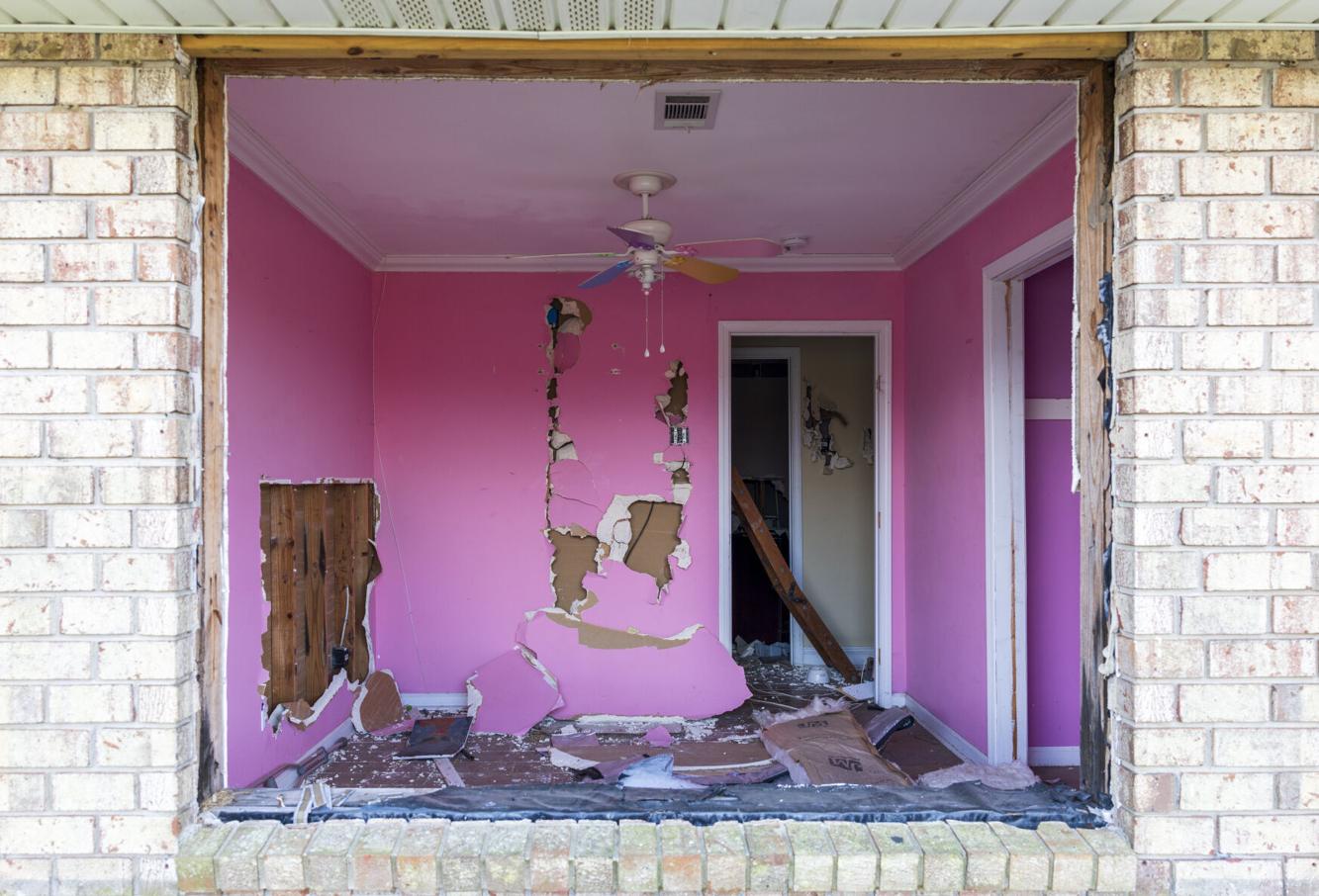 Photos: The first of 60 homes built on toxic landfill in New Orleans ...
