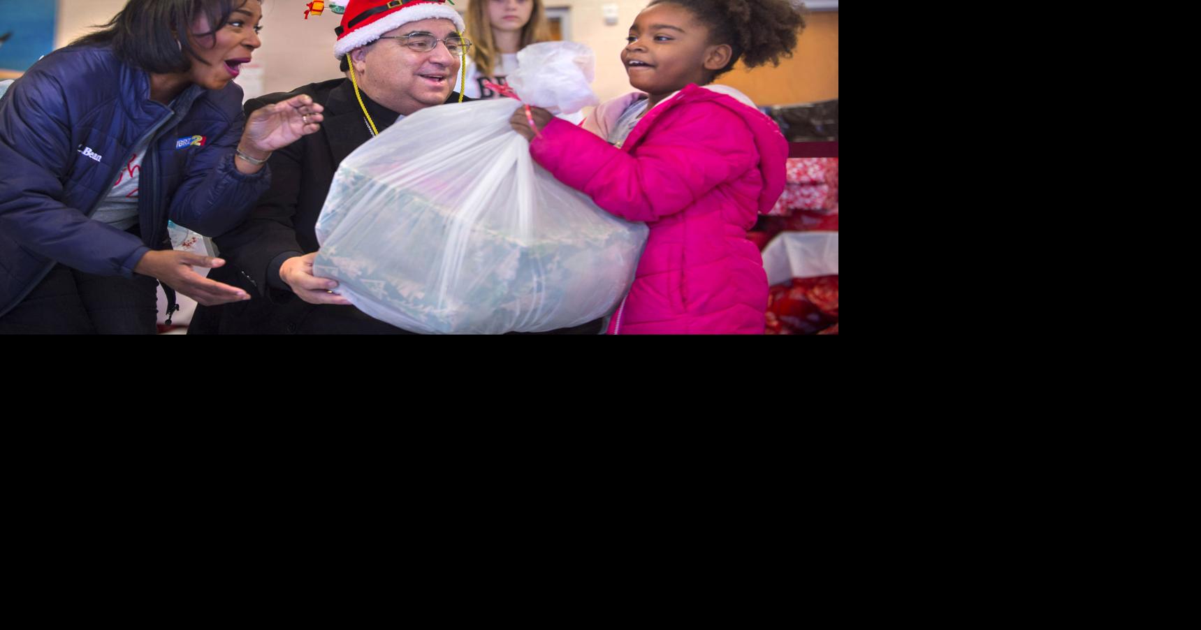 Photos & Video: Baton Rouge Bishop Michael Duca plays Santa at St ...