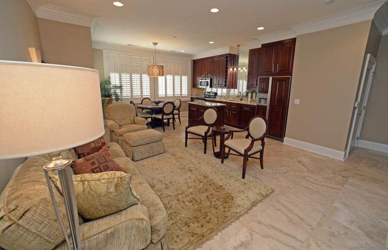 Luxury living: Ex-car dealership owner transforms 2 Perkins Rowe condos ...