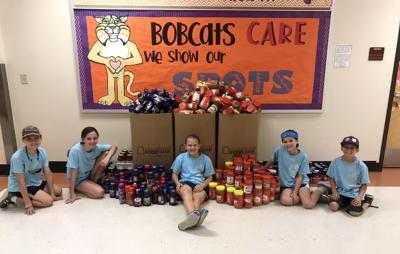 Spanish Lake Primary School Beta Club members collect peanut butter and ...