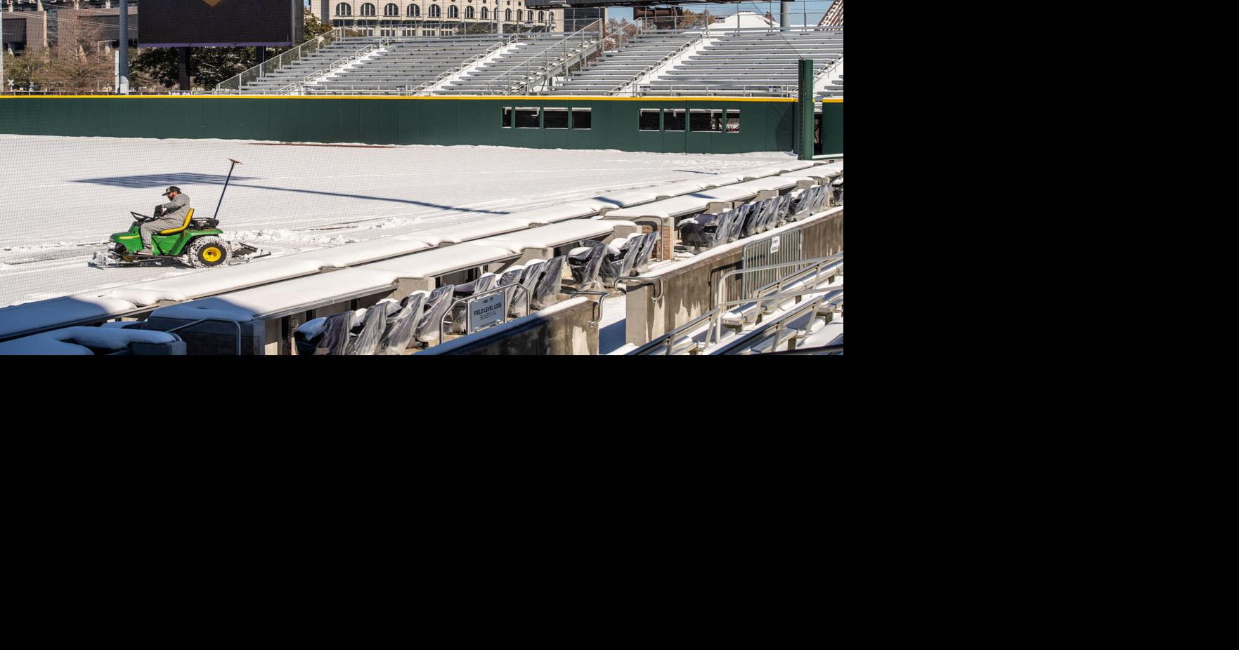 LSU grounds crew clear snow from field at Alex Box Stadium | Photos ...