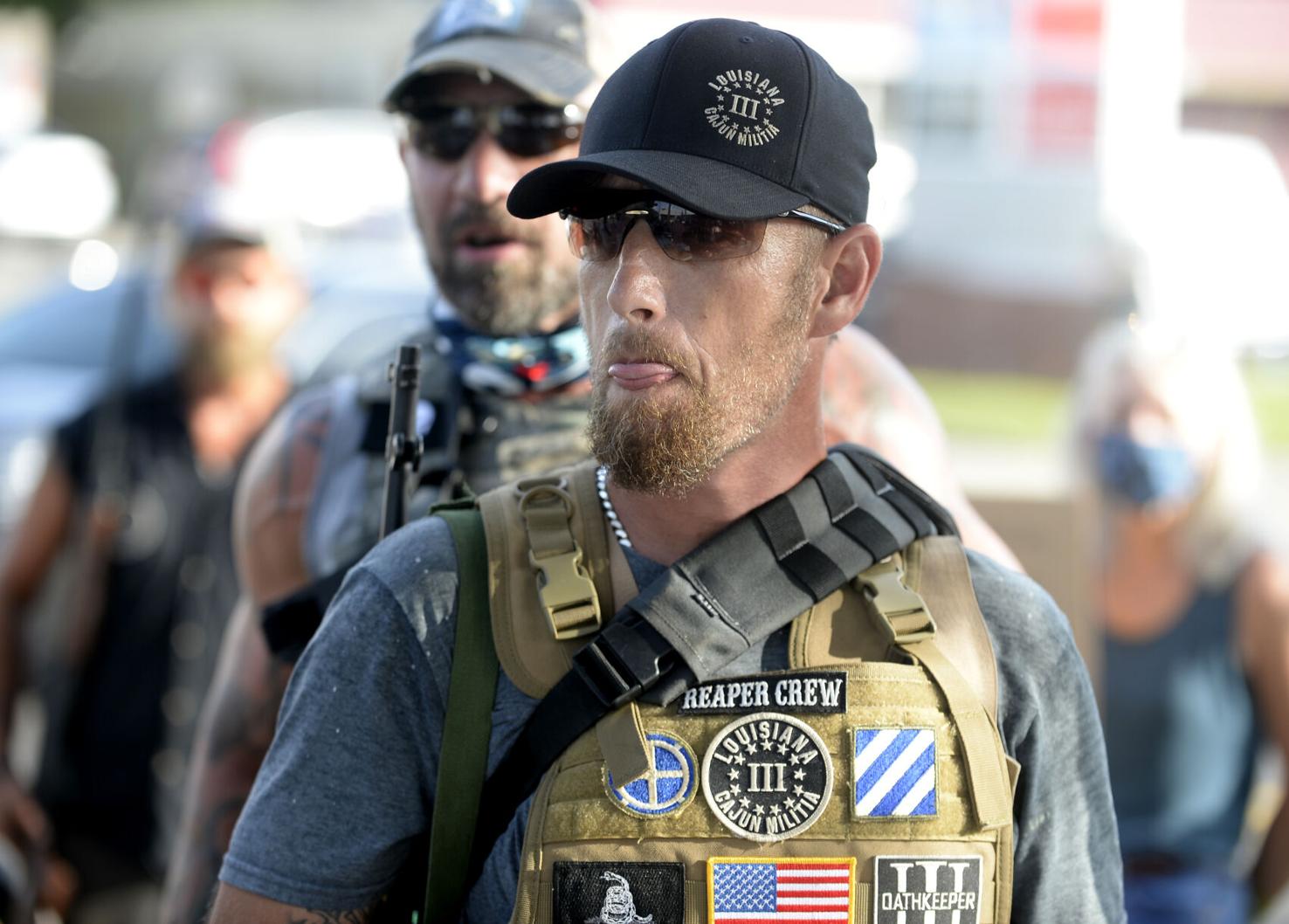 ACA.protestmilita009.090220.jpg | | theadvocate.com