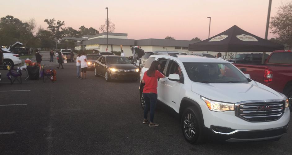 Cars line up for Boo with the Badge truck-or-treat events in Gonzales ...