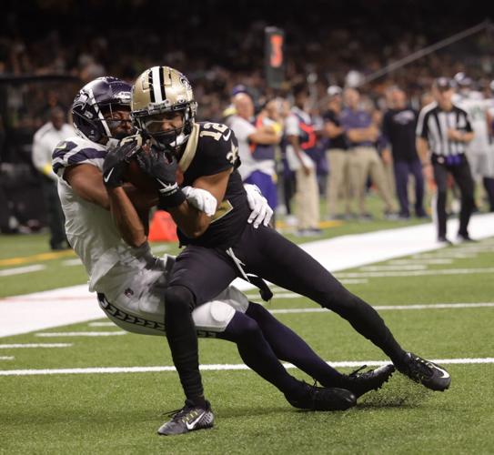 Saints star rookie WR Chris Olave leaves game vs. Seahawks with injury ...