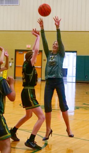 Copper Mill Elementary students and teachers face off in basketball ...