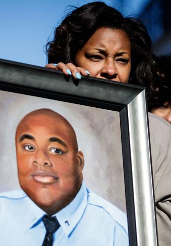 Photos: Family of Marcus McNeil receives his portrait | Photos ...