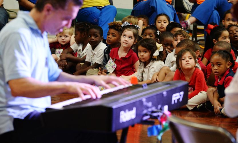 Photos: Composer Eric Genuis performs and speaks at Truman Early ...