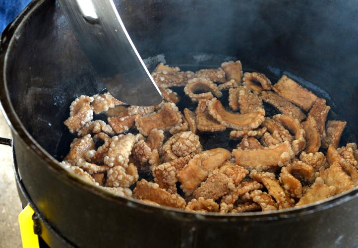 Cracklin' is king at the return of the Boucherie Festival | Ascension ...