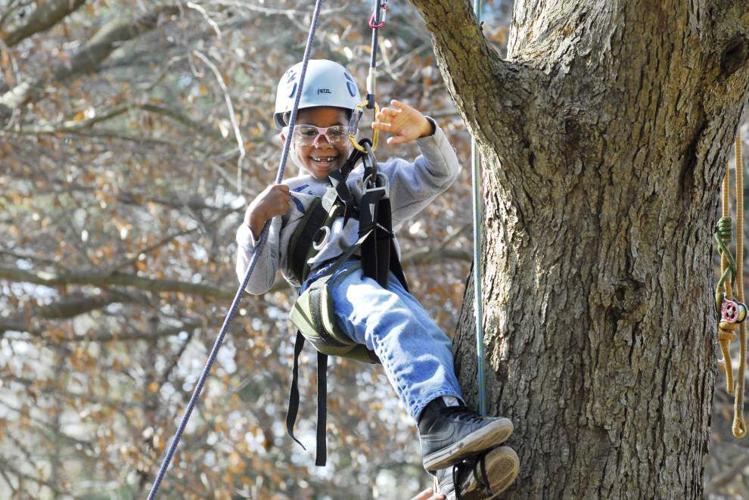 Tree planting a family affair, and tradition, at BR’s Burden Center ...