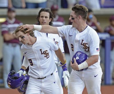 Use two hands! LSU's Zach Watson takes the old baseball adage to heart ...