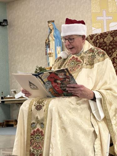 Father Connell reads 'Night Before Christmas' | News | thecabin.net