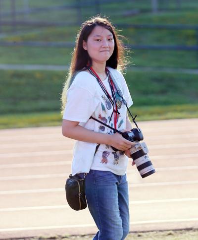 Staffer shares love of sports photography with daughter | Sports ...
