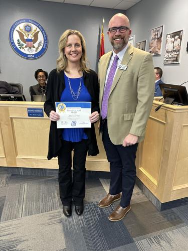 Crow recognized by school board for Coach of Year title | News ...