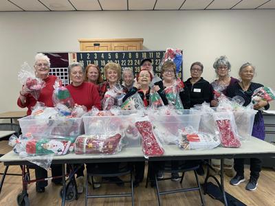 RP Fun After 50 Club donates Christmas stockings to local children ...