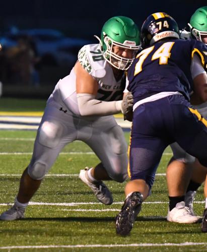 Trojans’ Bennett signs with Anderson football | Sports ...