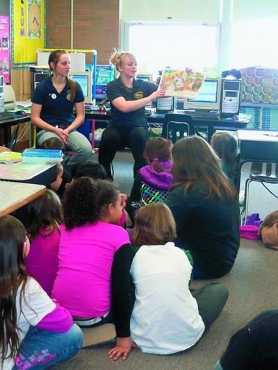 Albion FFA students Paige Levandowski and Michaela Miller ...