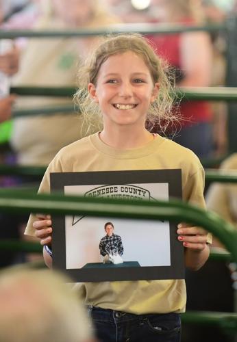 Show and sale: 4-H'ers present their animals at annual Genesee County ...