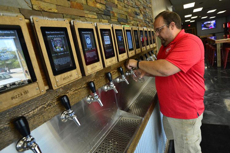 Expansion allows Pizza 151 to add dining area, Beer Wall | Business ...