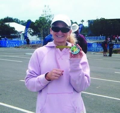 Joanne and her medal | | thedailynewsonline.com