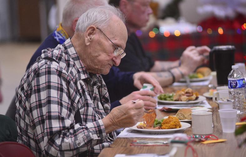 Seniors share Christmas traditions over Senior Center dinner ...