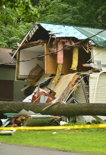 WATCH: 1 dead, another hospitalized after tree collapses on house in ...