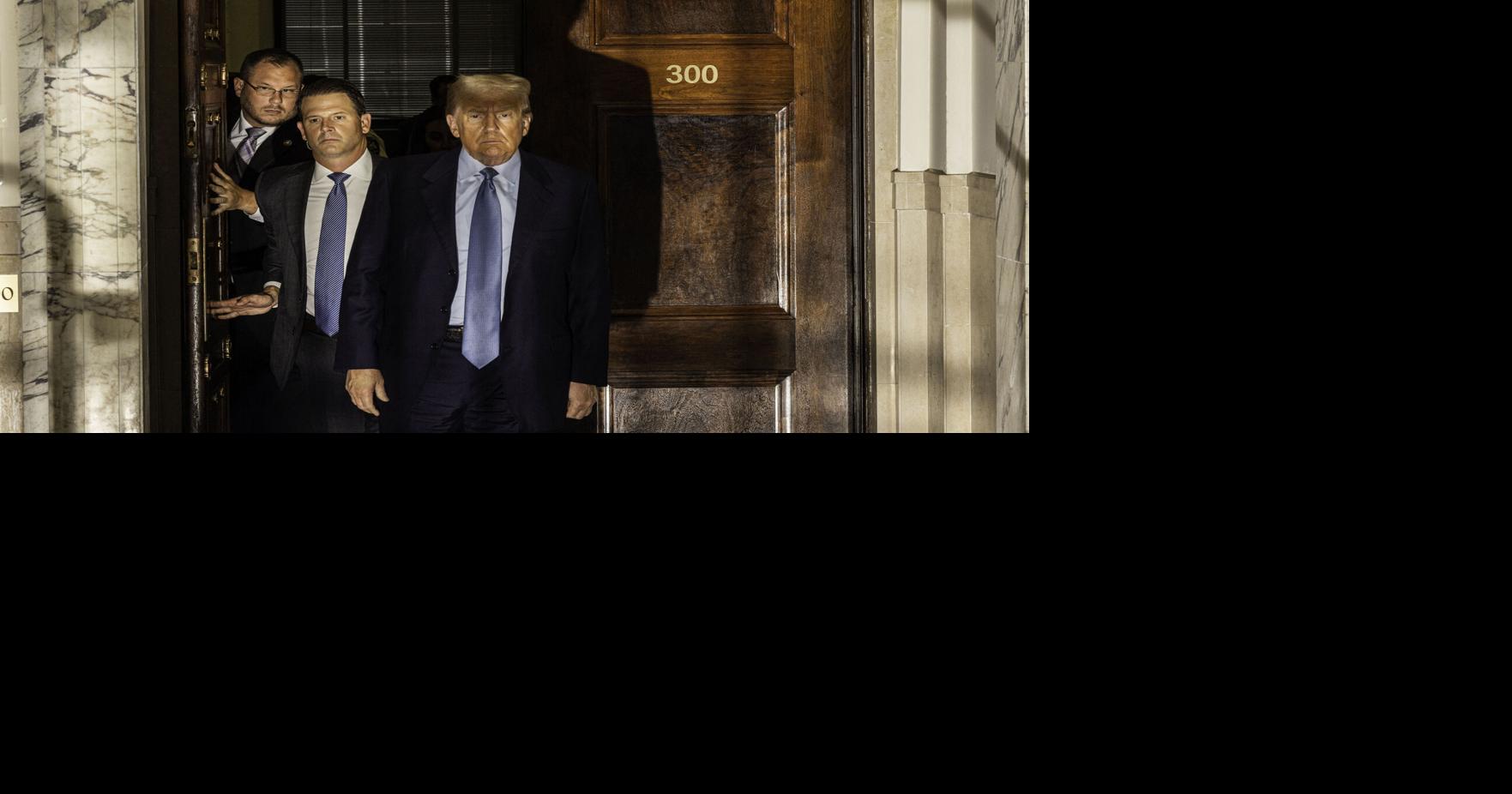 Court staffer arrested after approaching Trump during his NYC fraud ...