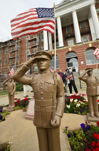 WATCH: Clean-up give VA statues new life in Batavia | Top Story ...