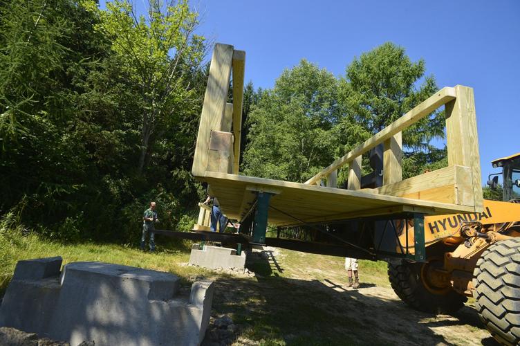Building a bridge, bonds Students construct bridge over Wetland Berm ...