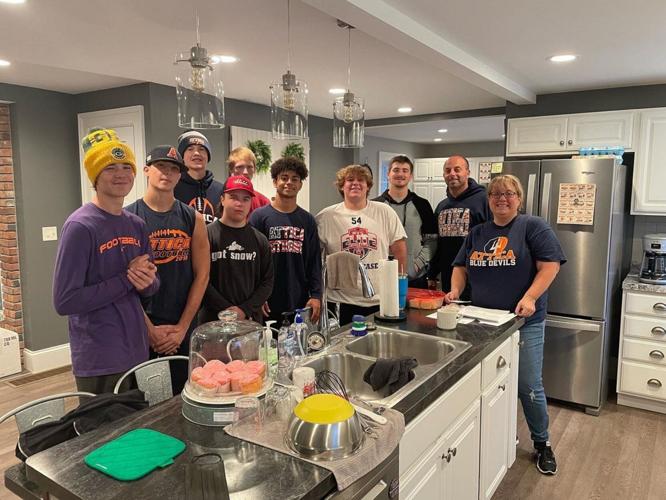 Blue Devils gridders lend helping hand at Attica Gateway Home | Sports ...