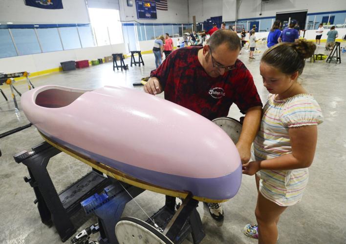 Prepping and testing: Young racers prepare for Boxcar Derby in Batavia ...