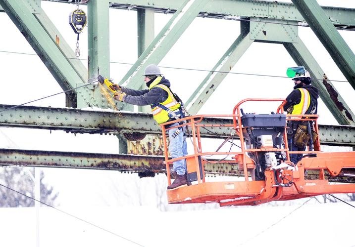 WATCH: And away it goes ... Crews disassemble Albion lift bridge | Top ...
