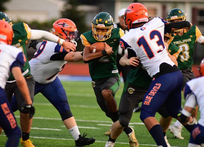 H.S. FOOTBALL: Alexander's defense propels Trojans to shutout victory ...