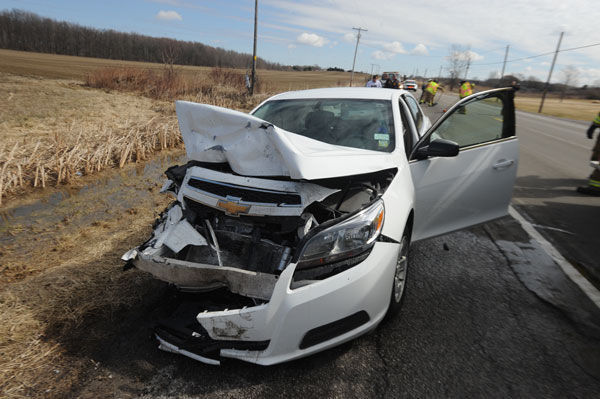 PHOTOS: Two injured in Route 33 crash | News | thedailynewsonline.com