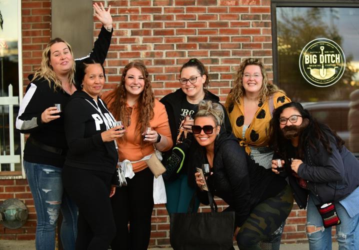 Crowds dress for the big top at annual Batavia Wine Walk | News ...