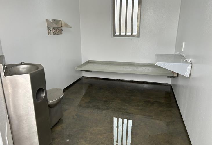 Some assembly required: Officials watch as first cell is installed at ...