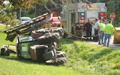 PHOTO: Tipped tractor in Darien | Local News | thedailynewsonline.com