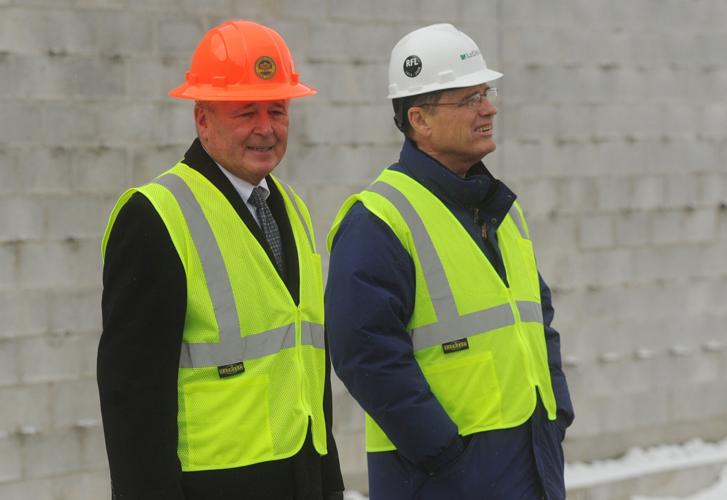 Some assembly required: Officials watch as first cell is installed at ...