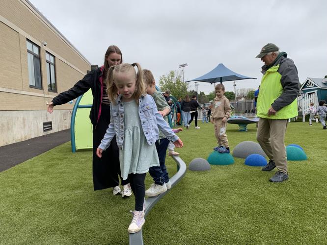 Great space to play: Robert Morris School dedicates new playground ...