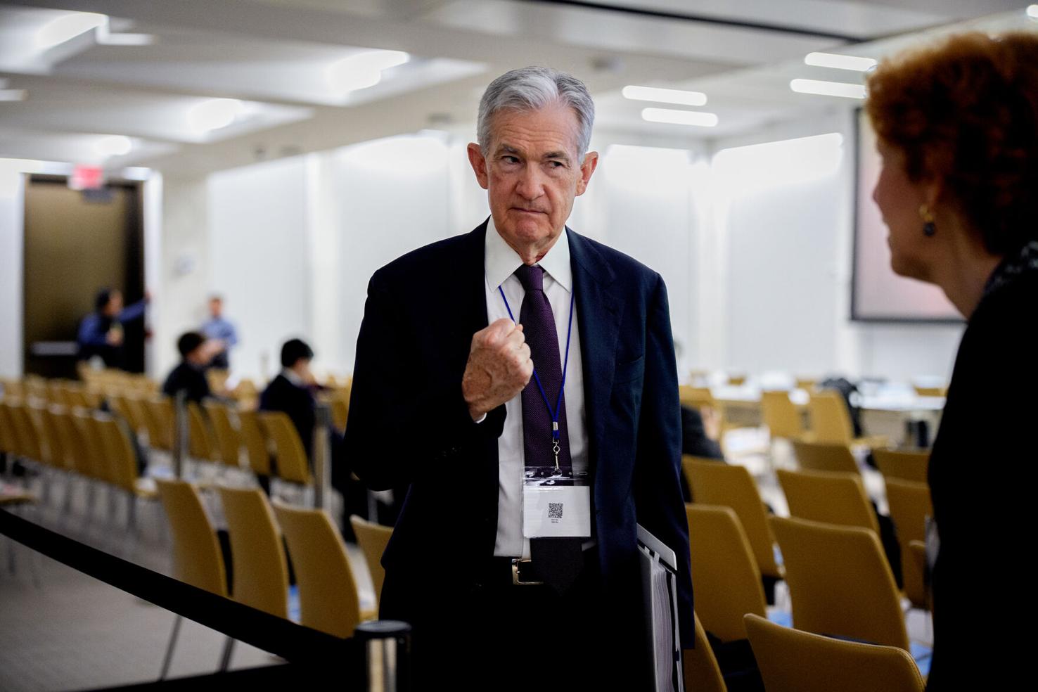 Dow hits record, bonds jump as Powell signals cut | News ...