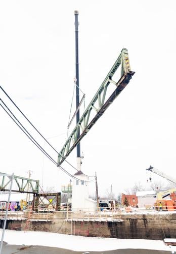 WATCH: And away it goes ... Crews disassemble Albion lift bridge | Top ...